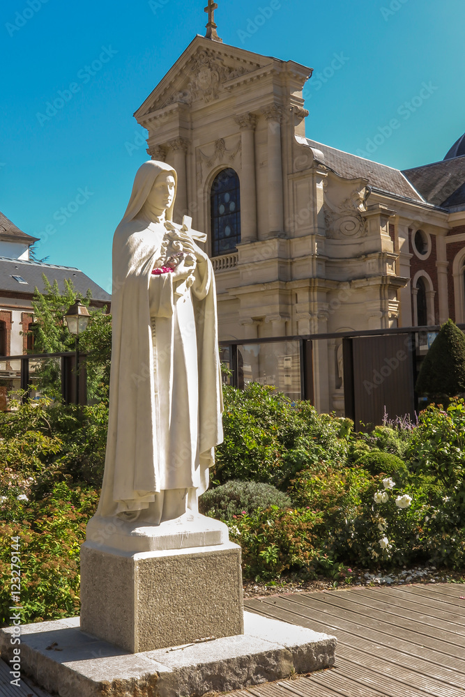 Poster Statue of St. Therese of the Child Jesus on the square in front ...