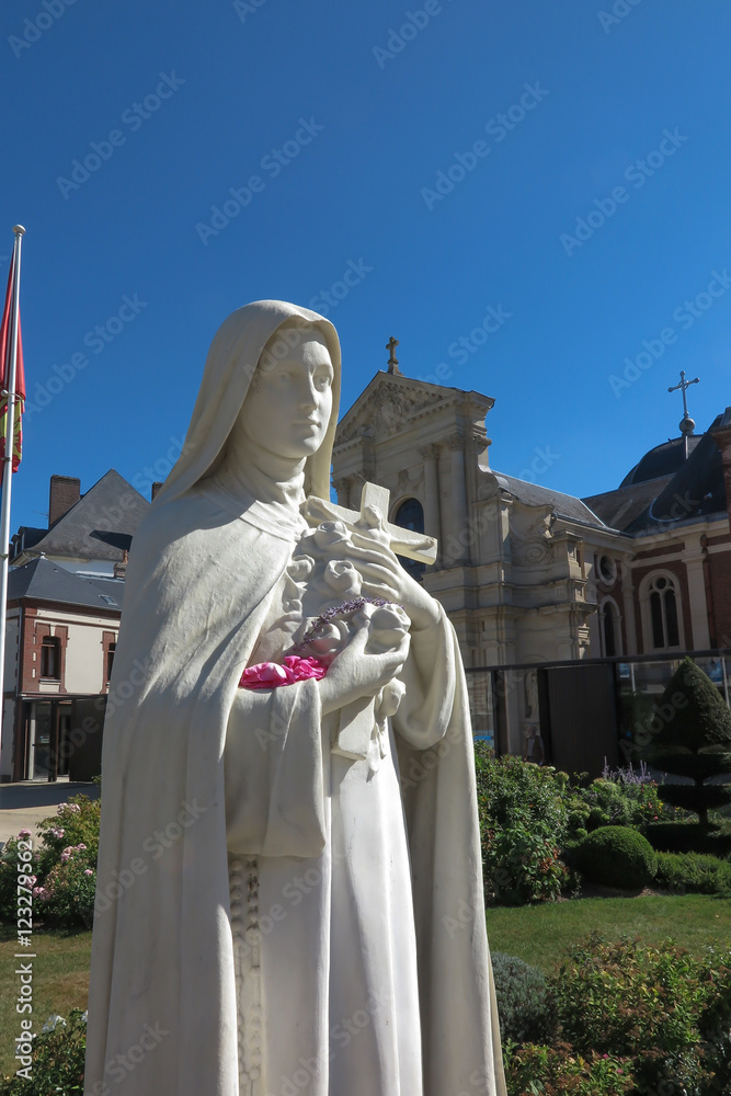 Poster Statue of St. Therese of the Child Jesus on the square in front ...