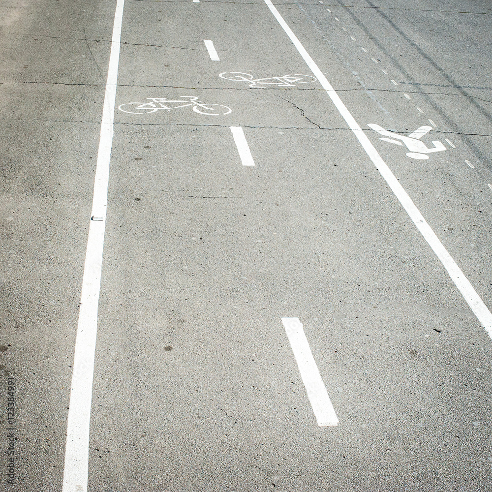 Bike path and pavement. Stock Photo | Adobe Stock