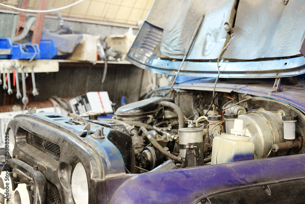 The image of a car engine under a hood Stock Photo | Adobe Stock