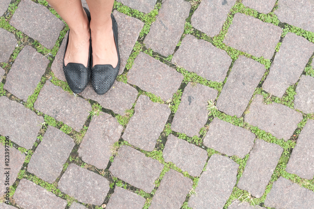 Grass Stone Floor texture pavement design and woman's feet. Stock Photo ...