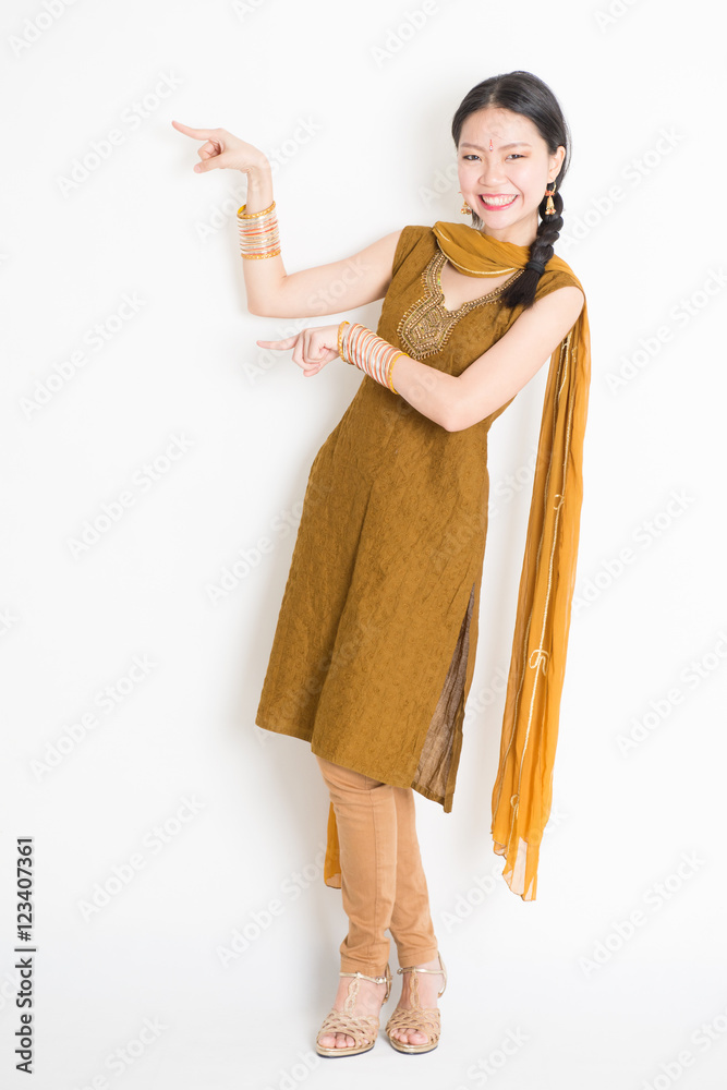 Indian Chinese woman fingers pointing Stock Photo | Adobe Stock