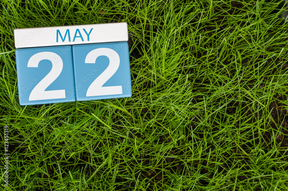 May 22nd. Day 22 of month, calendar on football green grass background ...