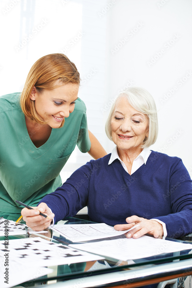 Senior woman doing memory training Stock Photo | Adobe Stock