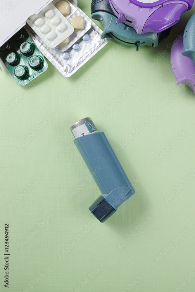 Asthma, allergy illness relief concept, salbutamol inhalers and pills ...