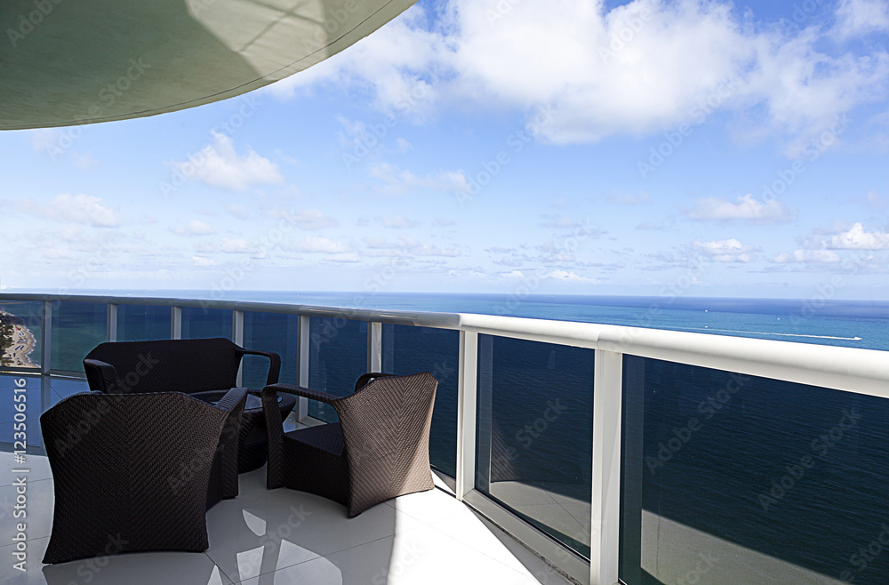 Modern glass balcony at ocean. A nice view of the sea from a te Stock ...