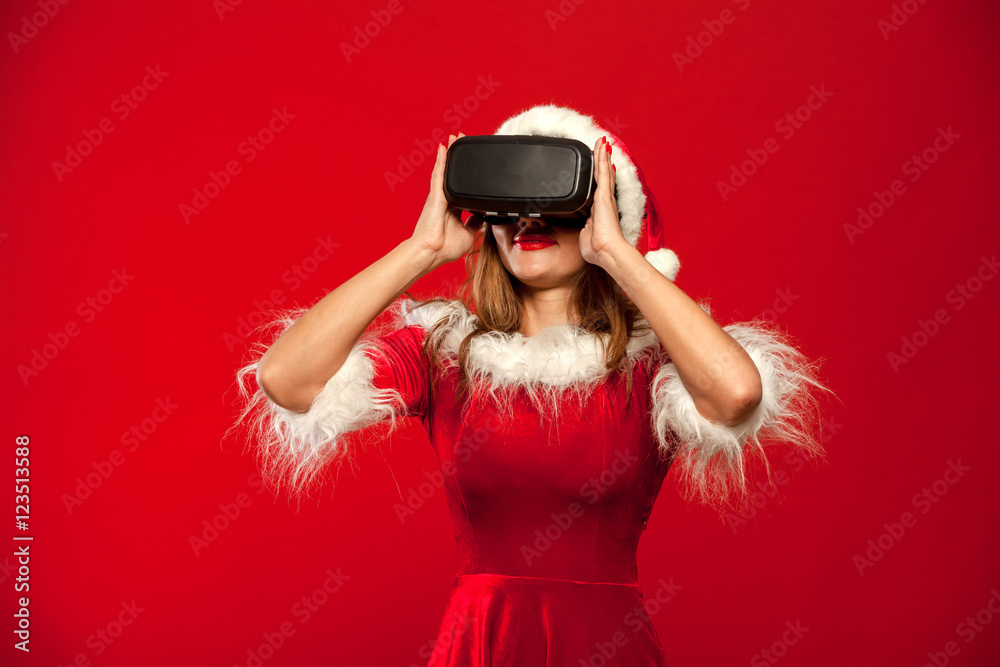 christmas, x-mas, winter, happiness concept - Beautiful young brunette ...