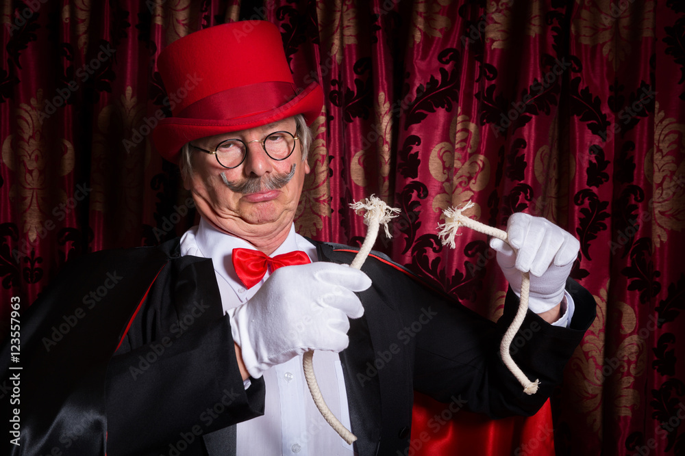 Sad magician with trick gone wrong Stock Photo | Adobe Stock