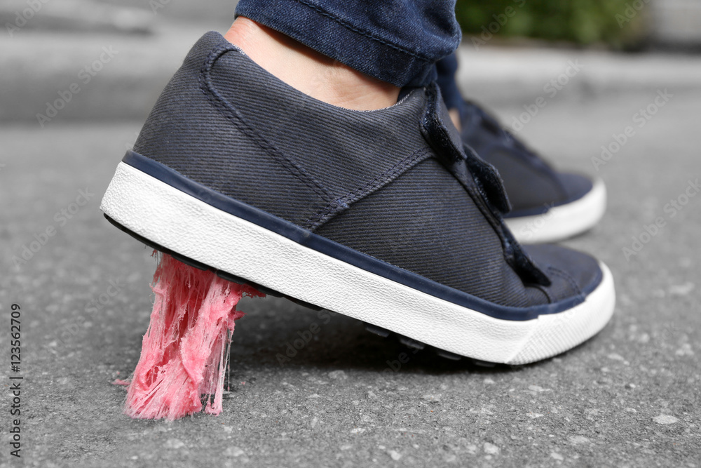 Foot stuck into chewing gum on street Stock Photo | Adobe Stock
