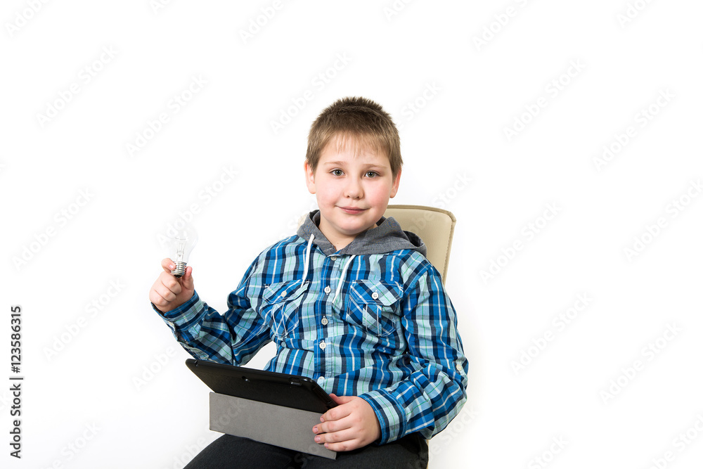 Smiling child holding tablet PC in hands. Idea concept. Photo sh Stock ...