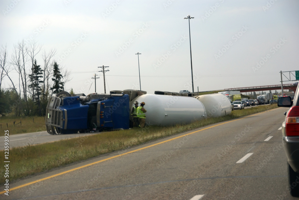 Tanker truck overturned on highway - traffic accident Stock Photo ...
