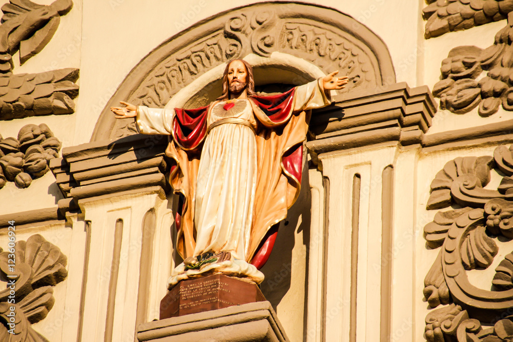 Old church facade with Jesus Sacred Heart statue Stock Photo | Adobe Stock