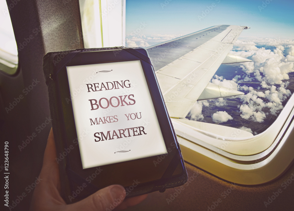 Human reading book inside airplane. Concept art Stock Photo | Adobe Stock