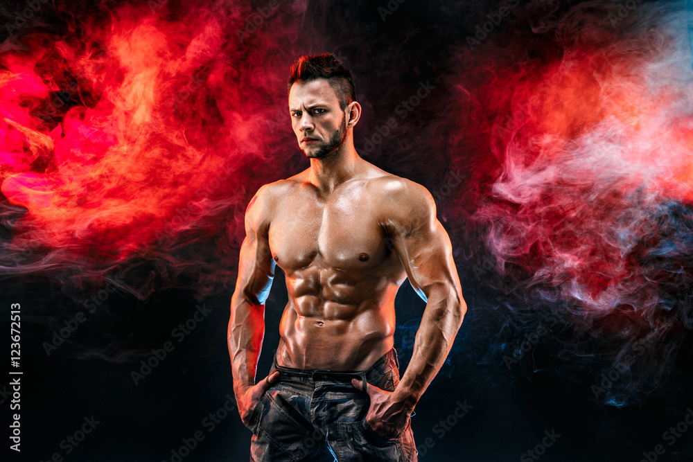 Strong bodybuilder with six pack. Man with perfect abs, shoulders ...