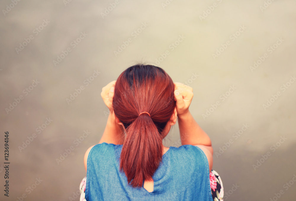 Sad girl on natural background Stock Photo | Adobe Stock