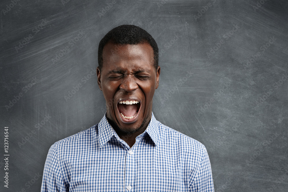 Shut up! Headshot of annoyed furious African high-school teacher ...