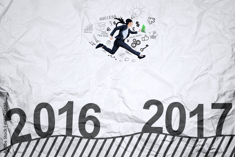 Female worker running on crumpled paper Stock Photo | Adobe Stock