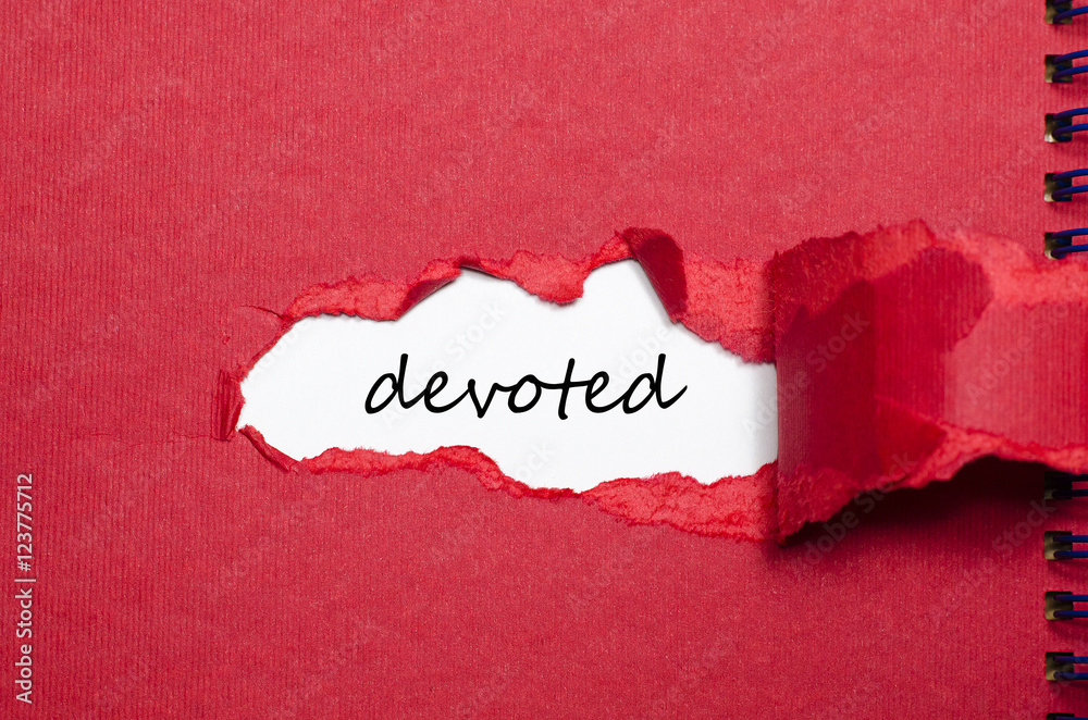 Poster The word devoted appearing behind torn paper – Wall Art | UkPosters
