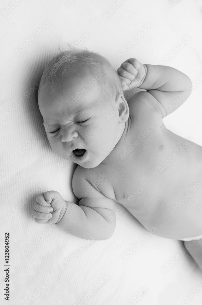 Cute adorable newborn baby yawning portrait Stock Photo | Adobe Stock
