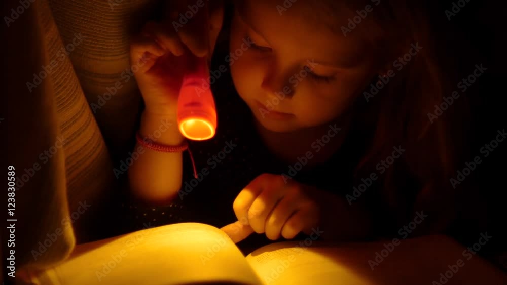 Girl reading under the covers with flashlight. Child Reading In Bed ...