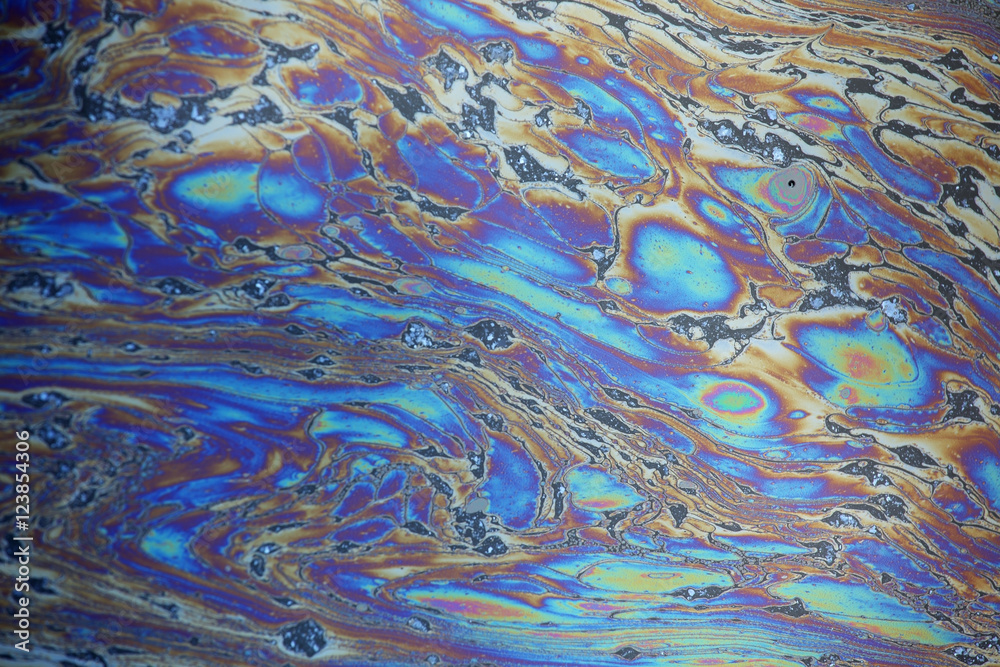 rainbow oil slick background. Stock Photo | Adobe Stock