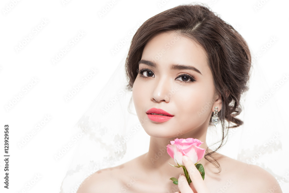 Happy bride with a bouquet of roses. Isolated on white backgroun Stock ...