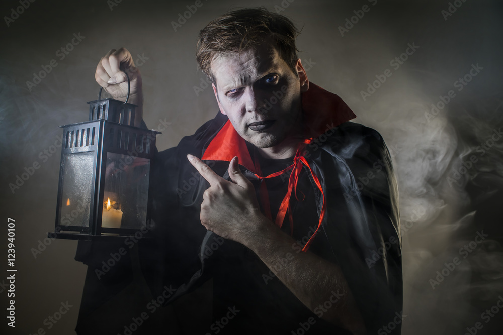 vampire count Dracula waves his hand and shows a scary gesture Stock ...