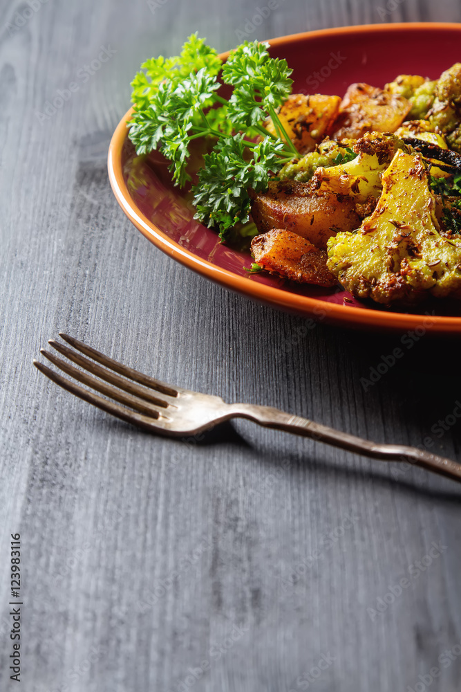 Traditional Indian Aloo Gobi fish with potato, cauliflower and s Stock ...