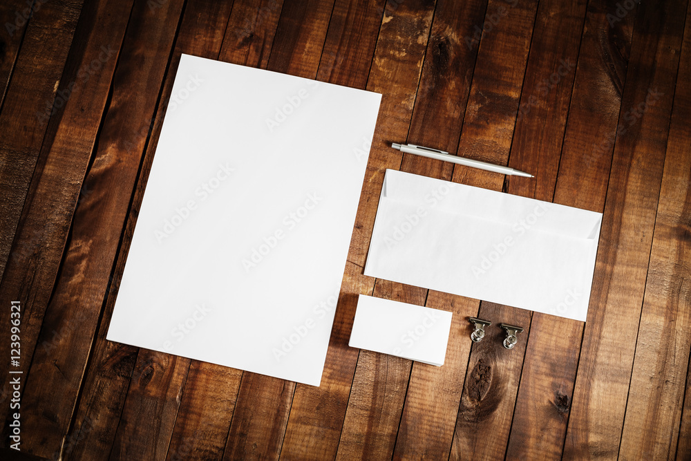 Blank stationery set on wooden table background. Blank paperwork ...