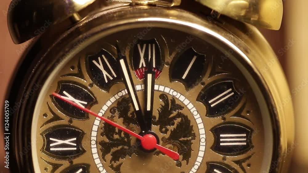 Old golden clock is ticking closeup. Stock Video | Adobe Stock