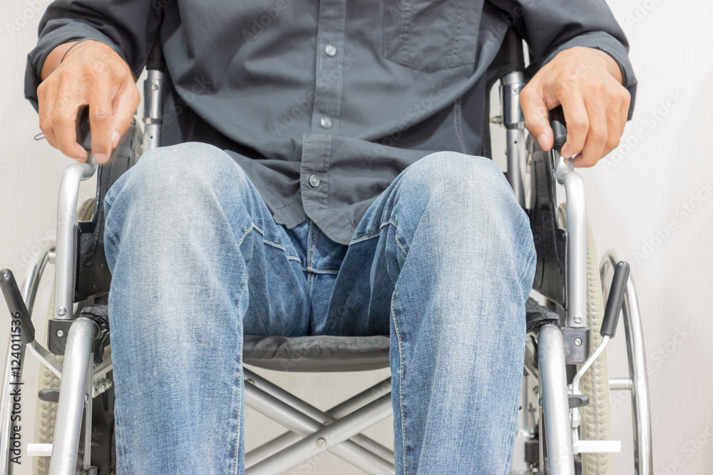 Poster Paralyzed man using his wheelchair – Wall Art | UkPosters