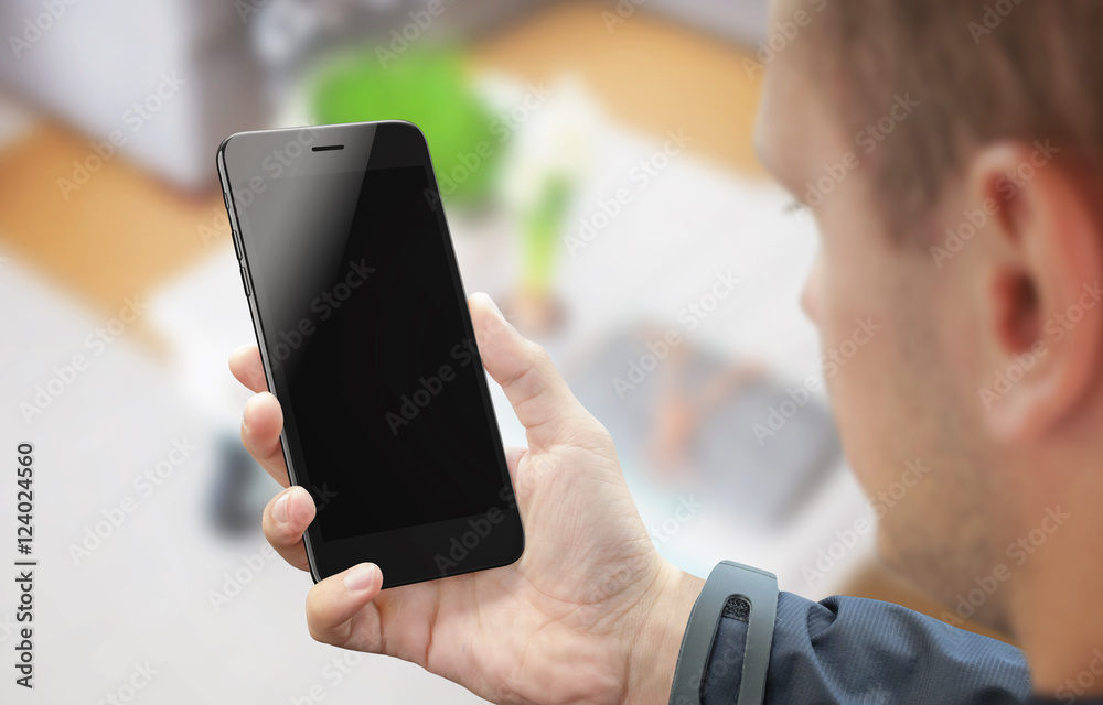 Man work on smart phone display. Isolated smart phone for mockup in ...