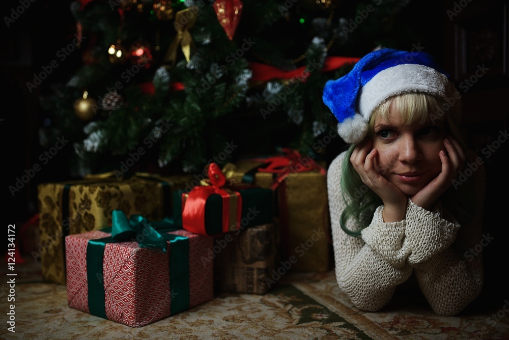 Portrait Of Sexy Young Girl Under Christmas Tree With Presents Stock