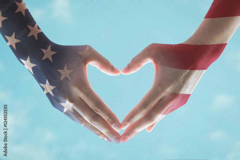 American flag pattern on human hands in heart sign shape, text message ...
