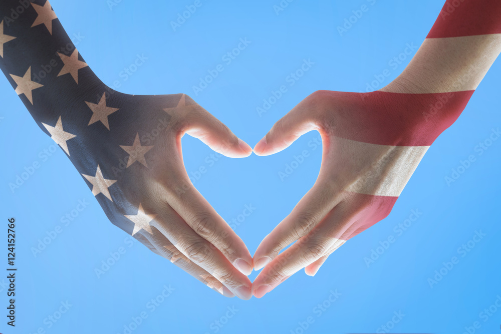 American flag pattern on human hands in heart sign shape, text message ...