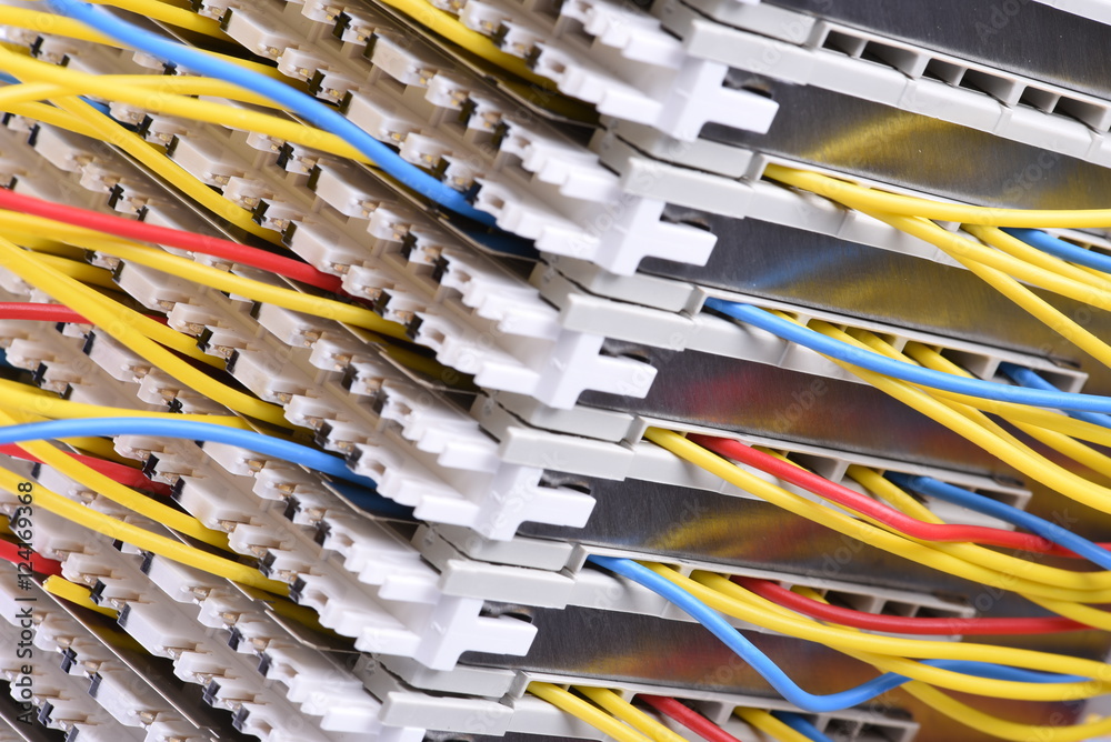 Telecommunication main distribution frame with colorful cables, close ...