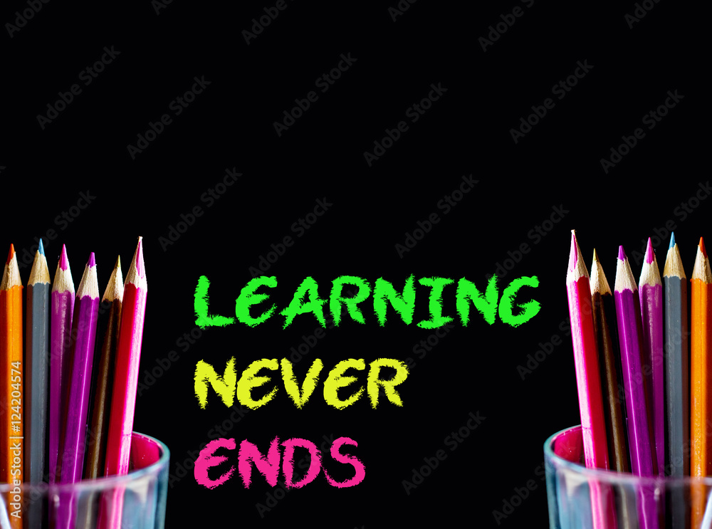 Color pencil on black background with word: LEARNING NEVER ENDS Stock ...