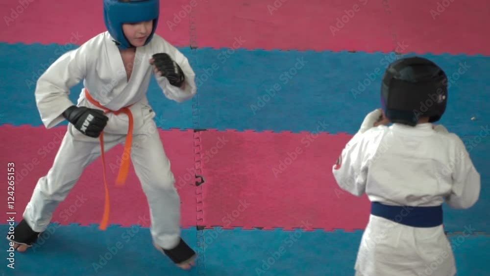 Kids karate competition. Fight a duel of teenagers. Children are ...