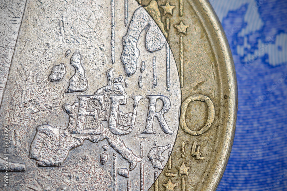 Poster Detailed close up of "Euro" lettering on an one euro coin and a ...