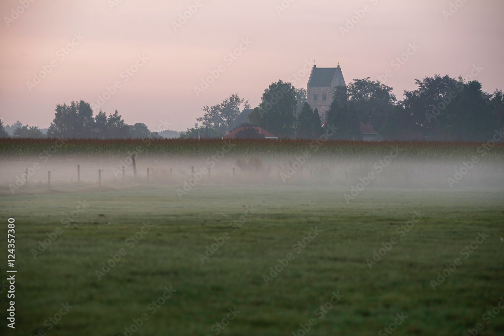 Old churchtower over corn field in morning fog. Geesteren. Gelde Photos ...