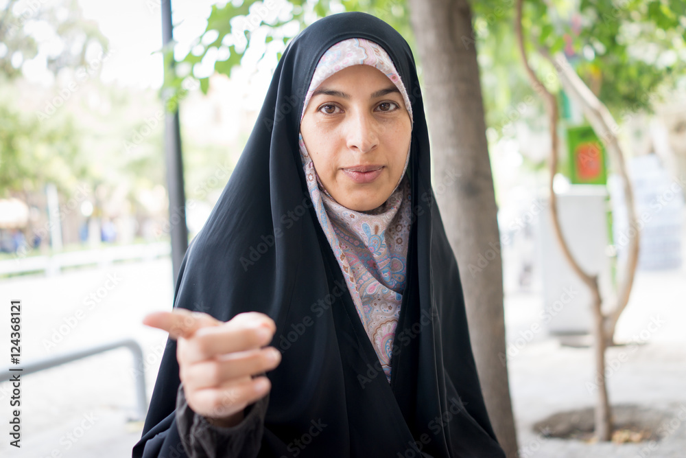 Beautiful Muslim woman spending time on traditional Iranian baza Stock ...