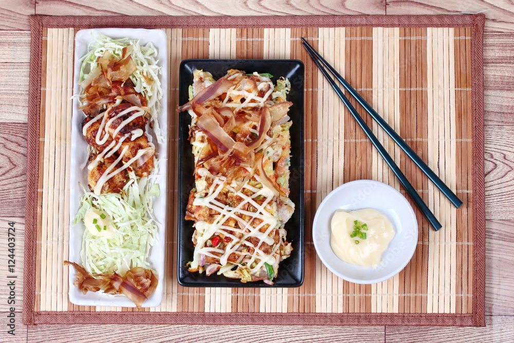 Grill flour wrap squid (as Takoyaki) served with Japan pizza (as ...