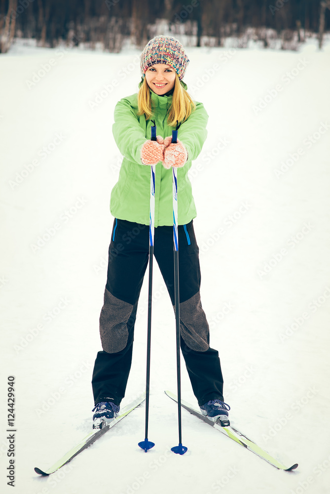Young Woman with ski happy smiling face winter time snow Skiing Sport ...