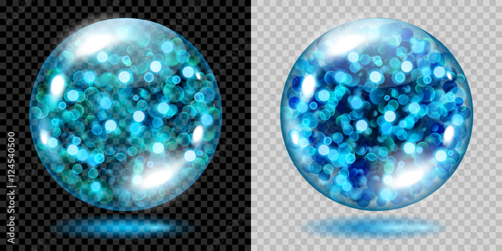 Two transparent spheres filled with light blue glowing sparkles with ...