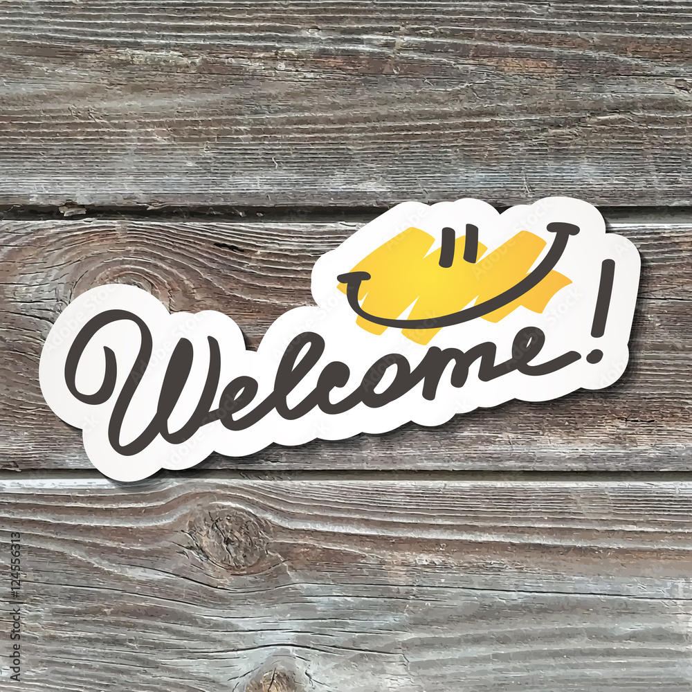 welcome, handwritten text, paper sticker on realistic wood texture ...