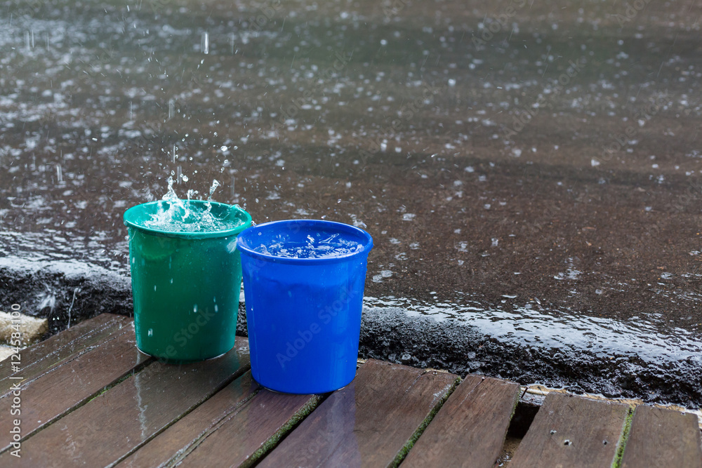 rain drop in bucket water, weather rainy season Stock Photo | Adobe Stock
