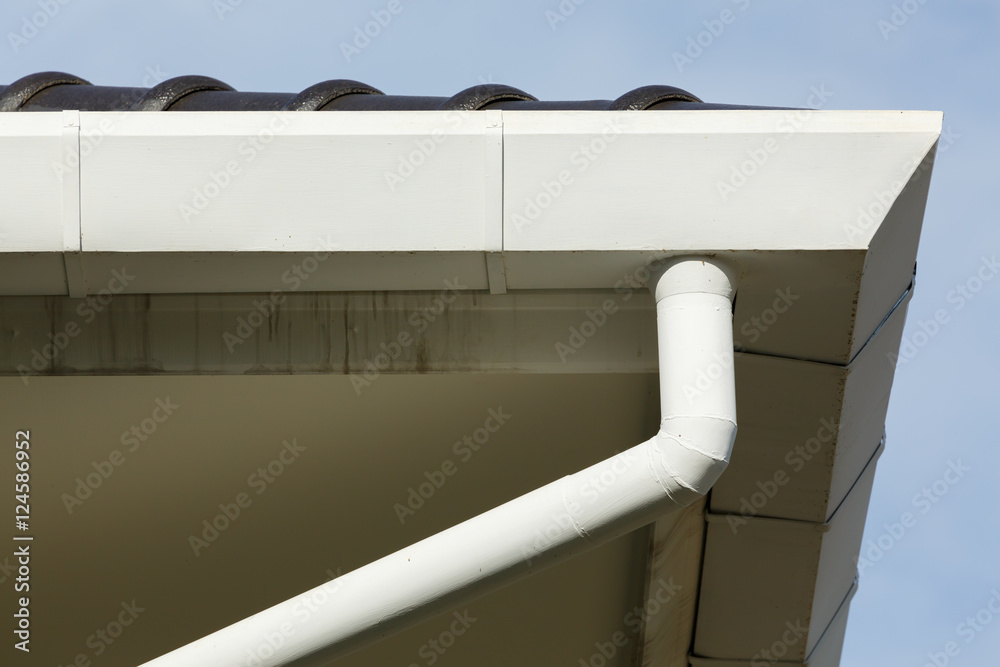 gutter on roof top residential building house Stock Photo | Adobe Stock