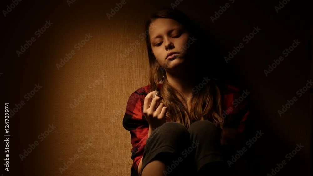 Teen girl. Drug addiction. Depressed face of a teen girl with overdose ...