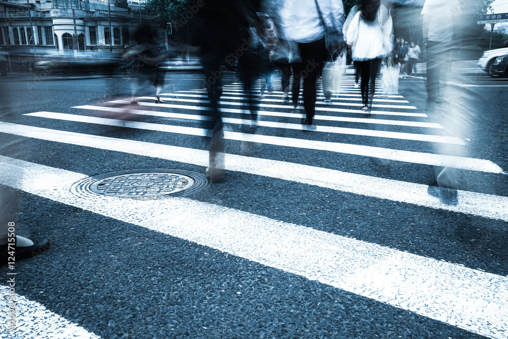 Crosswalk and pedestrian at modern city zebra crossing street. Blur ...