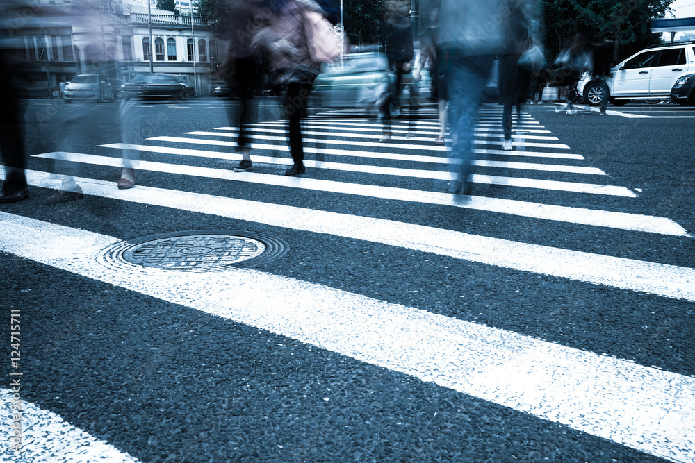 Crosswalk and pedestrian at modern city zebra crossing street. Blur ...